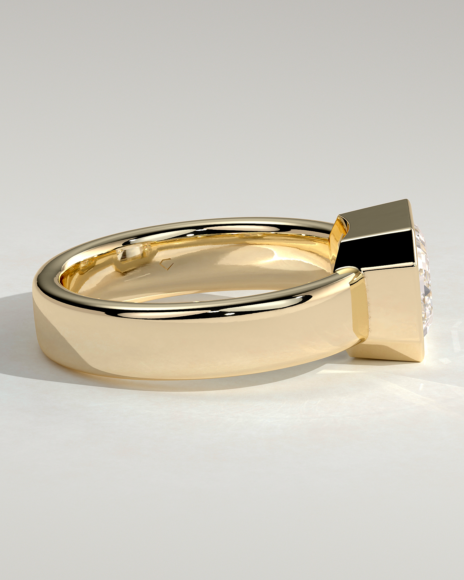 Adrian - Statement Emerald East West Bezel Solitaire with Flat Cigar ...